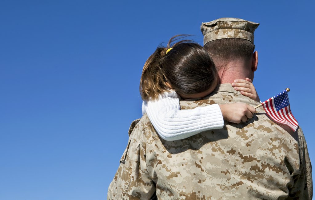 Military Man Hugs Daughter - Tell Your Story with Evalogue.Life